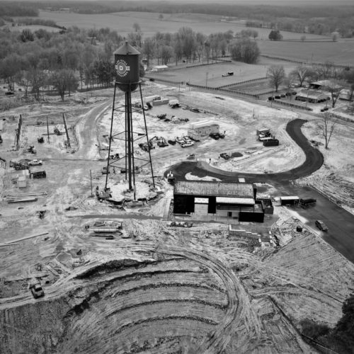 Log Still Distillery - Aerial Photo of Visitor Center and Amphitheater ...