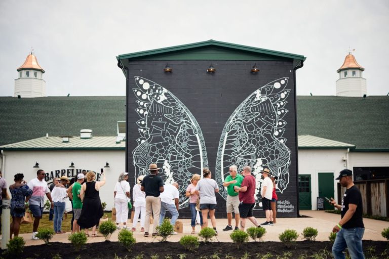 Nearest Green Distillery - The 'What Lifts You' Angel Wings mural by ...